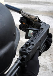 Crooked gun shoots round corners | New Scientist