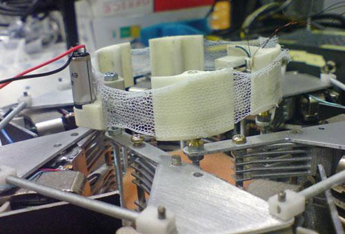 Pulsing web gives ailing hearts a boost | New Scientist