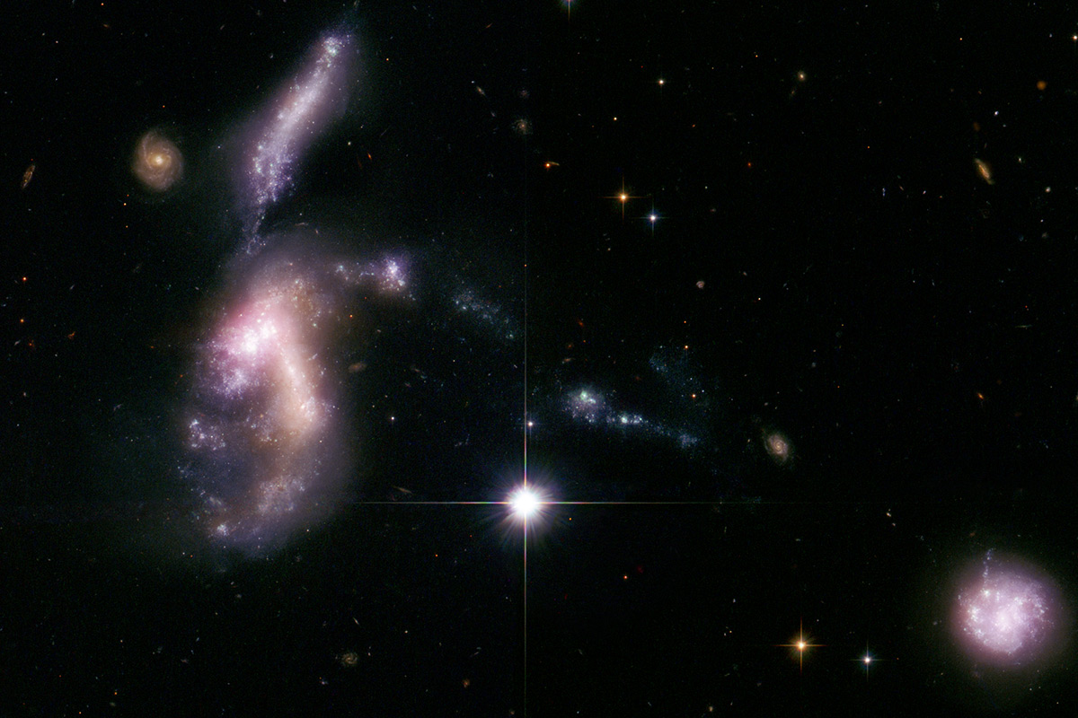 First evidence of dwarf galaxy merger boosts two cosmic theories | New Scientist